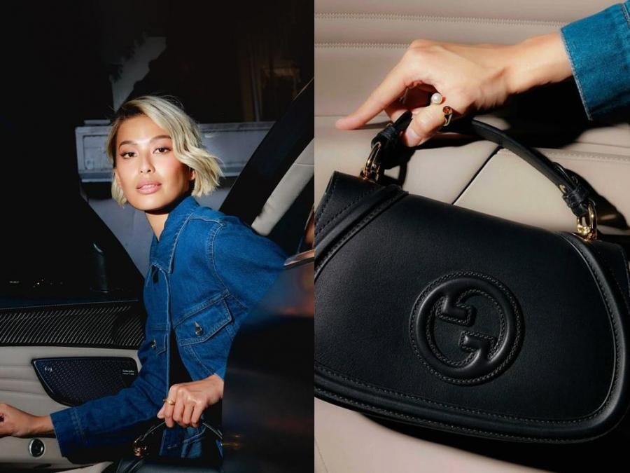 Michelle Dee makes the street a runway with a designer bag