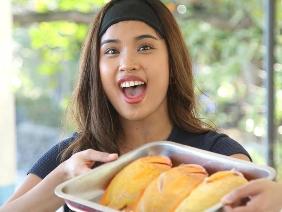 Sparkle 10 artist Shuvee Etrata tries out this golden fish