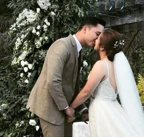 WATCH: Joyce Ching and Kevin Alimon share first-ever kiss at their wedding | GMA Entertainment